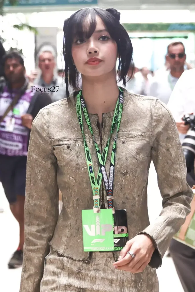 Lisa waving the chequered flag at the F1 Miami Grand Prix 2024 - We Are ...